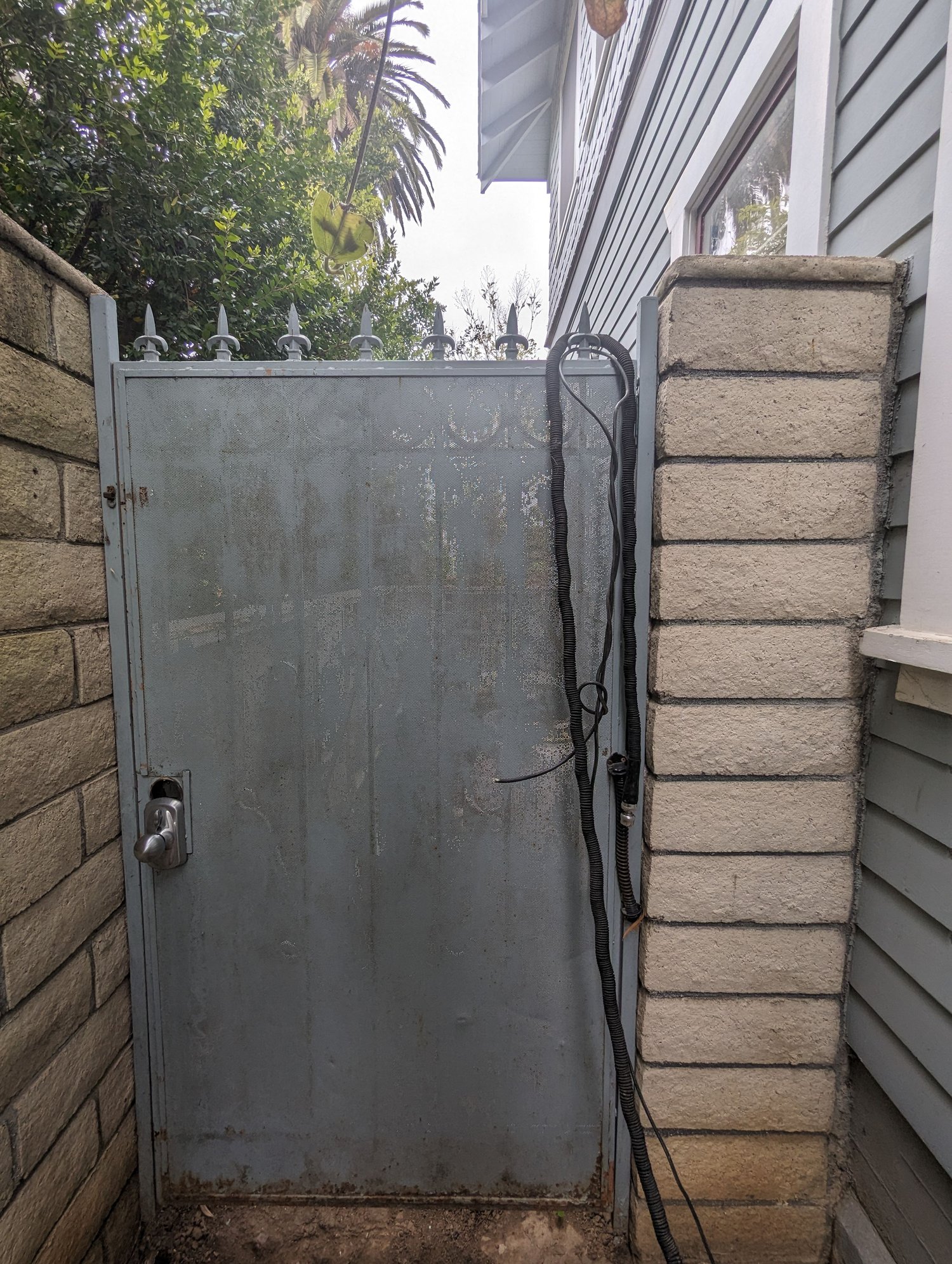 How to repair a leaning cinderblock column (attached to house and gate ...