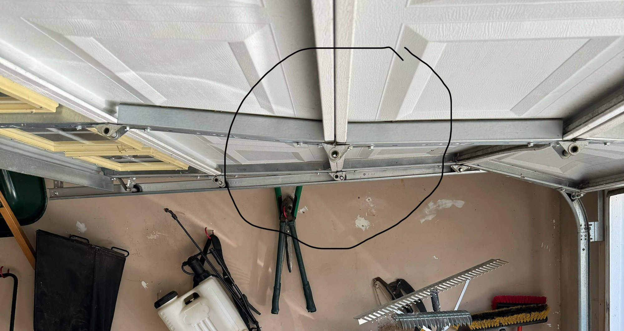 Garage door buckled - DoItYourself.com Community Forums