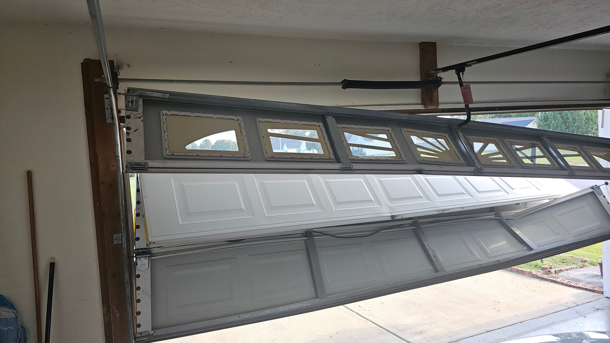 Older type plastic riveted hinge garage door folded on itself - DoItYourself.com Community Forums