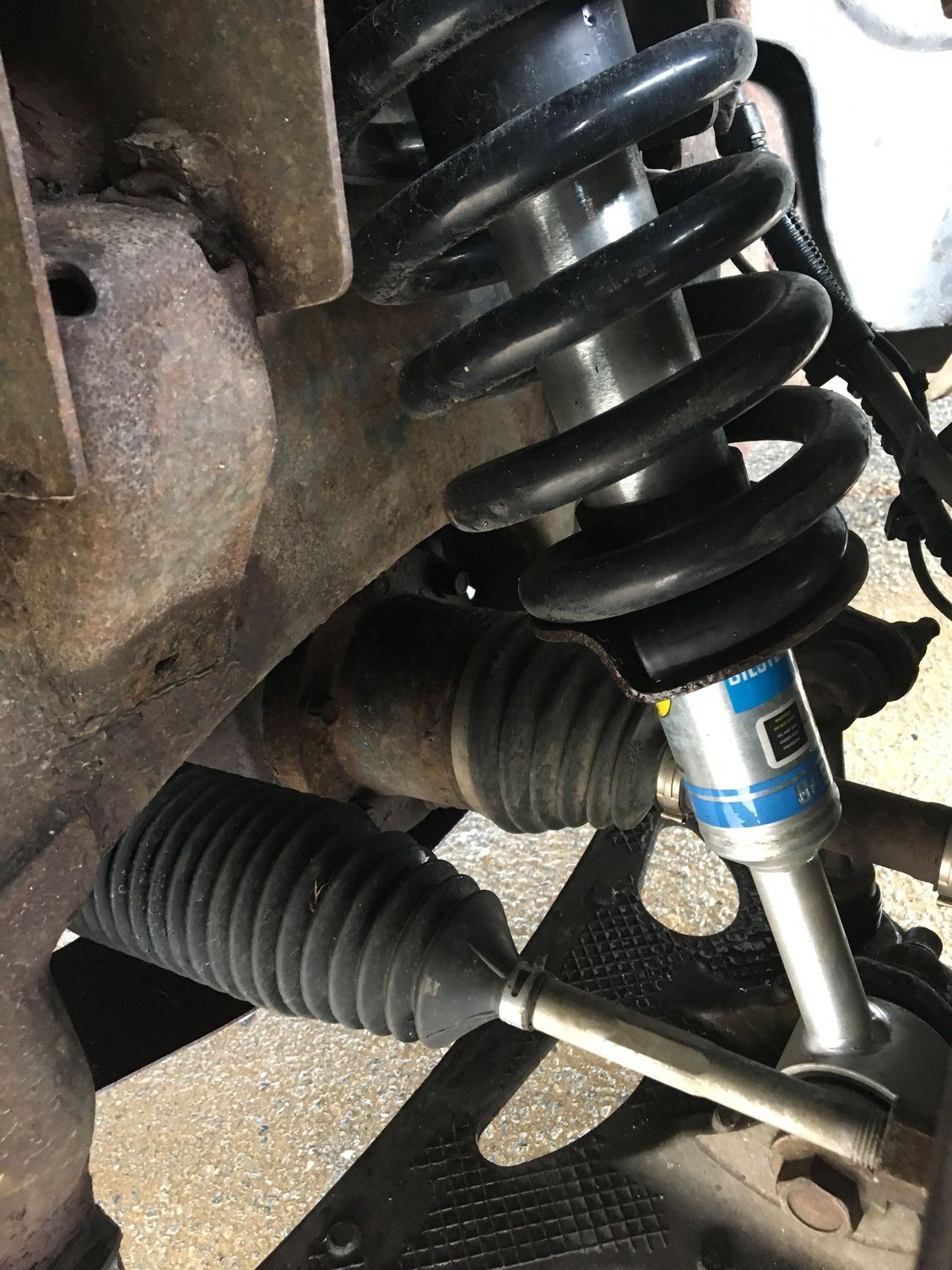 Front Strut Tower Dilemma - Anyone know where to buy the lower spring ...