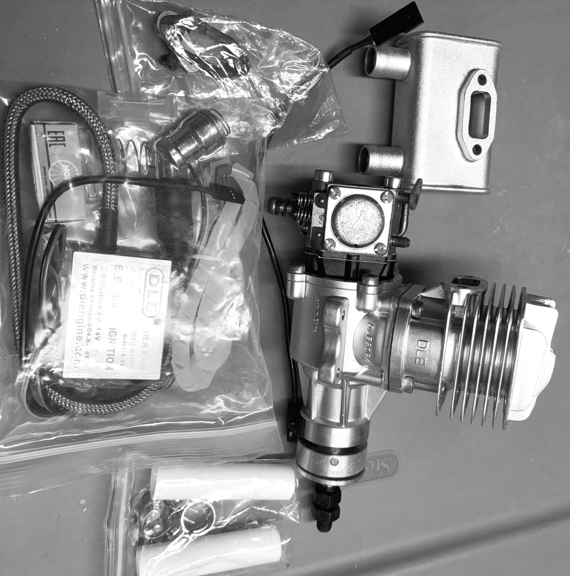 NIB DLE 20 RA Engine w/Ignition & Muffler, Never Mounted or Fueled. - RCU Forums